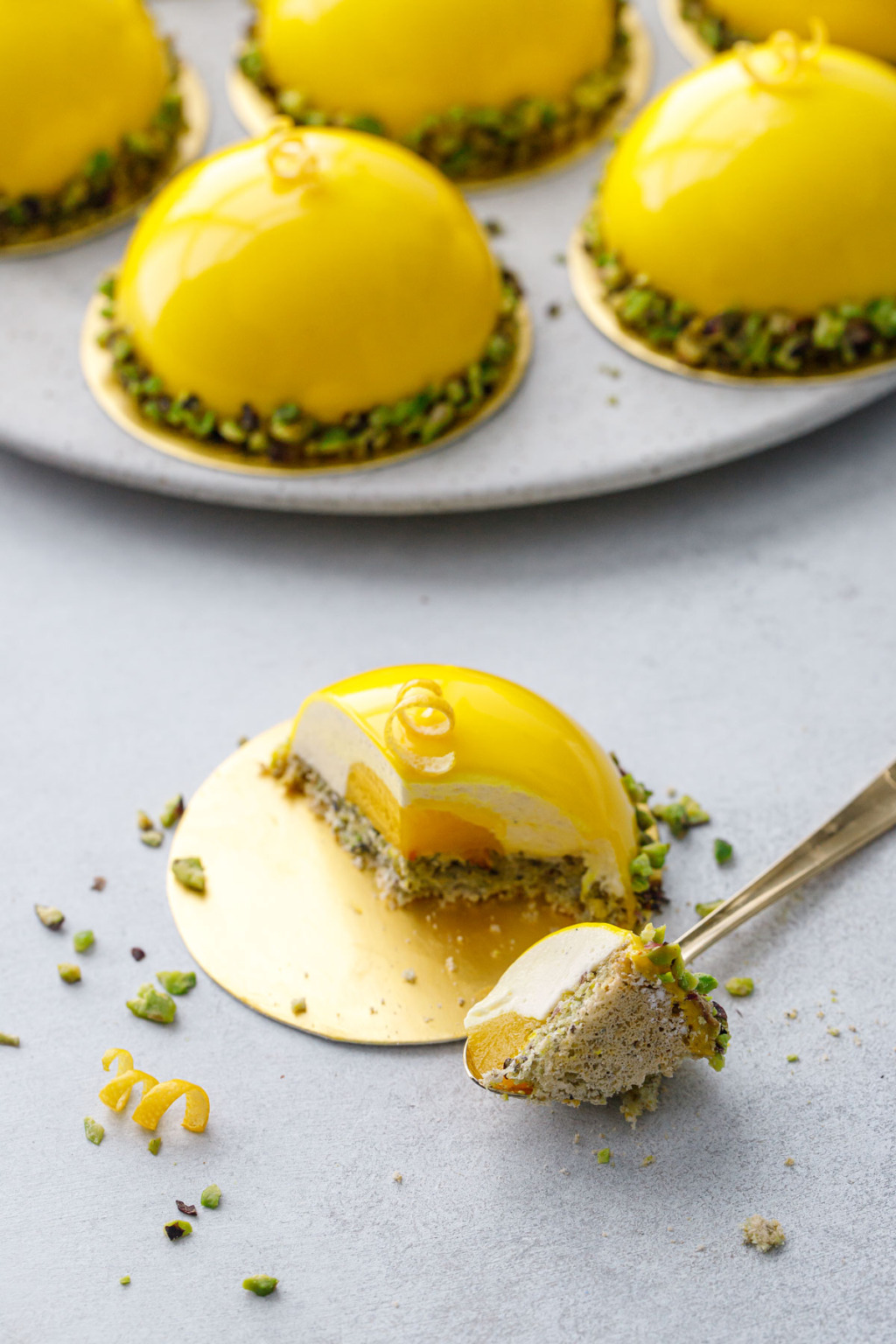 Pistachio & Meyer Lemon Mousse Cakes with Mirror Glaze | Love and Olive Oil