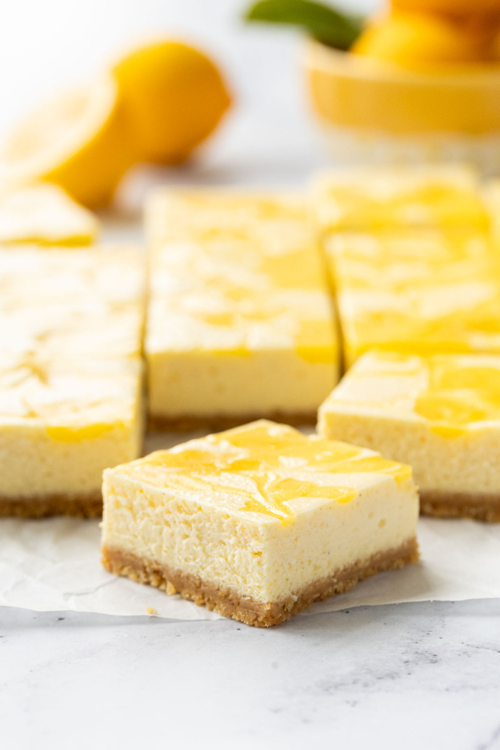 Meyer Lemon Cheesecake Bars with Lemon Curd Swirl | Love and Olive Oil