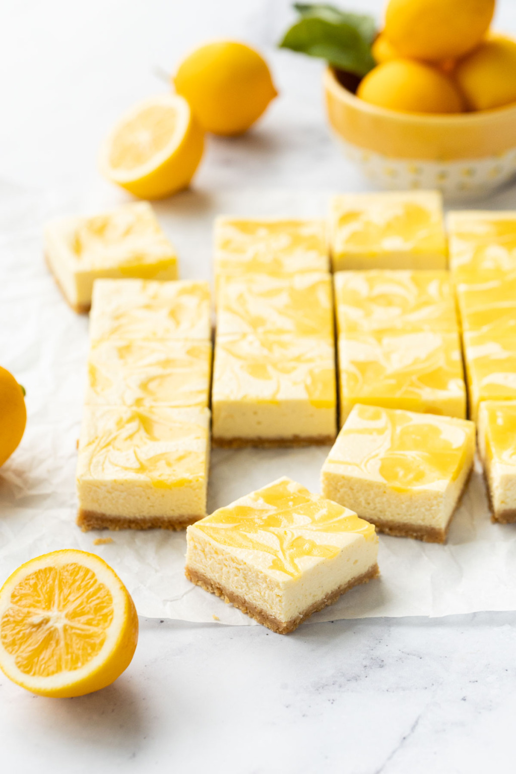 Meyer Lemon Cheesecake Bars with Lemon Curd Swirl | Love and Olive Oil